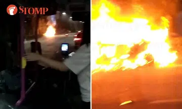 Passengers on passing bus shocked to see electric vehicle in flames on ...