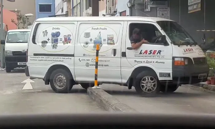 If you have time to spare, watch poor van driver try to get out of back ...