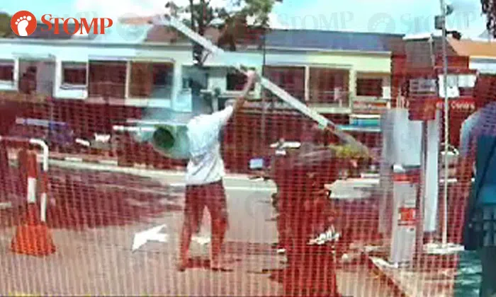 Biker takes matters into his own hands by lifting carpark gantry arm ...