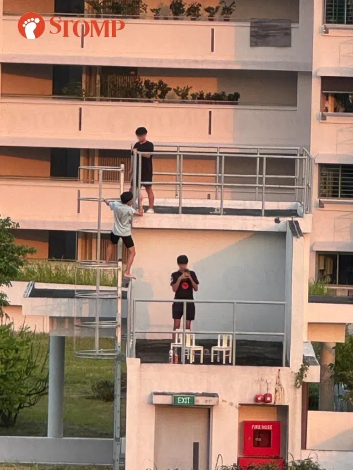 Boys climb roof in Serangoon, throw chairs and bottles onto street: Police investigating | STOMP