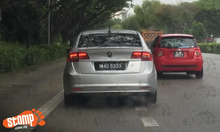 Do you get the cute message in this car's unusual licence plate? | STOMP