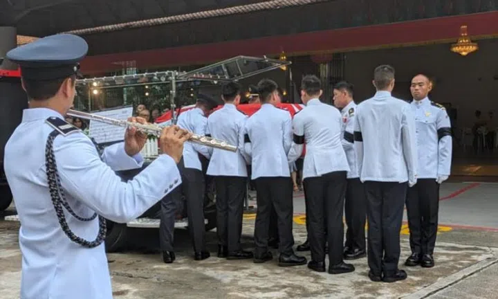 SCDF officer's parents and dog bid final farewell to son who died ...