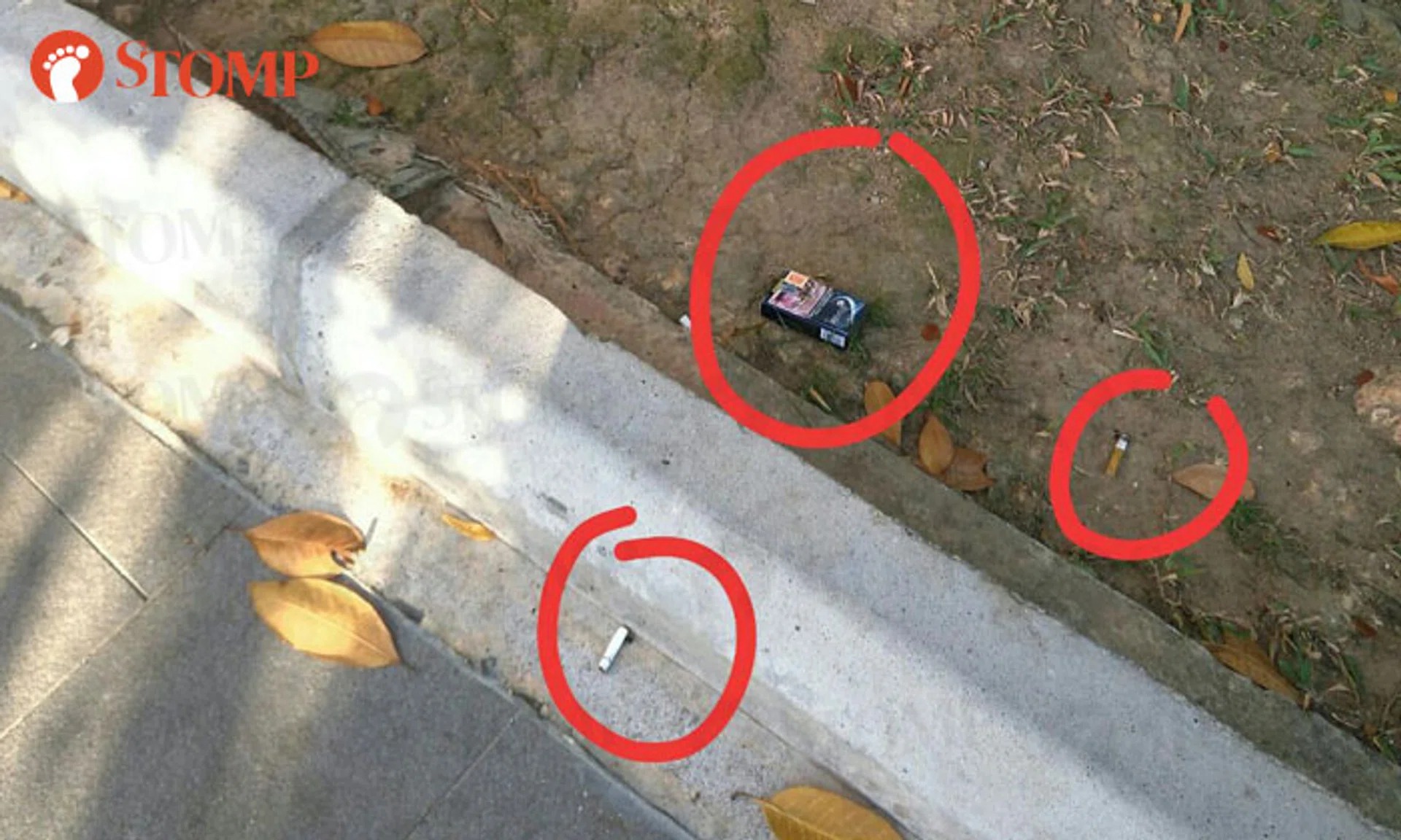 Woman irked by cigarette butts and packets strewn on ground outside ACE ...