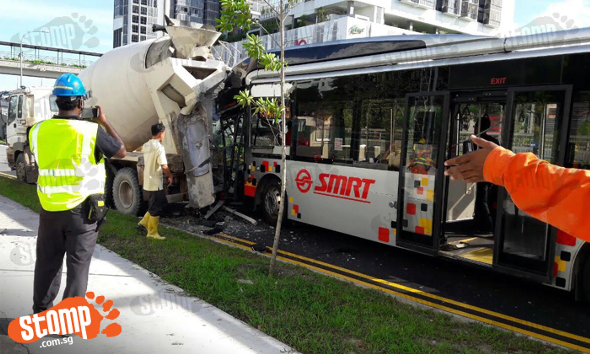 SMRT bus and cement mixer truck collide near Ten Mile Junction LRT ...