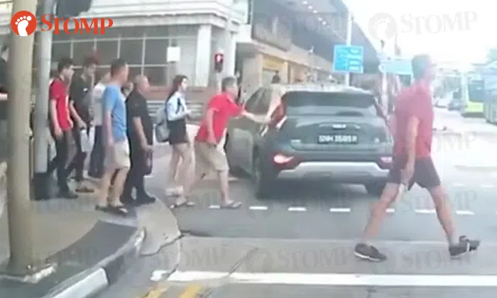 Man 'slaps' car that failed to stop for pedestrians, both he and driver ...