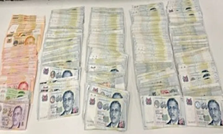 13 women and suspected online pimp arrested for vice, condoms and ...