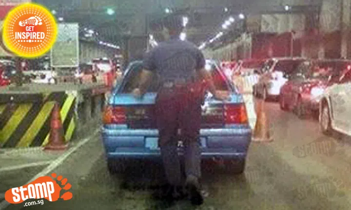 Checkpoint officer, you make us proud by helping old Malaysian uncle ...