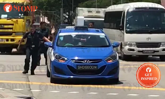 Certis CISCO officers help push taxi that broke down along Geylang Road ...