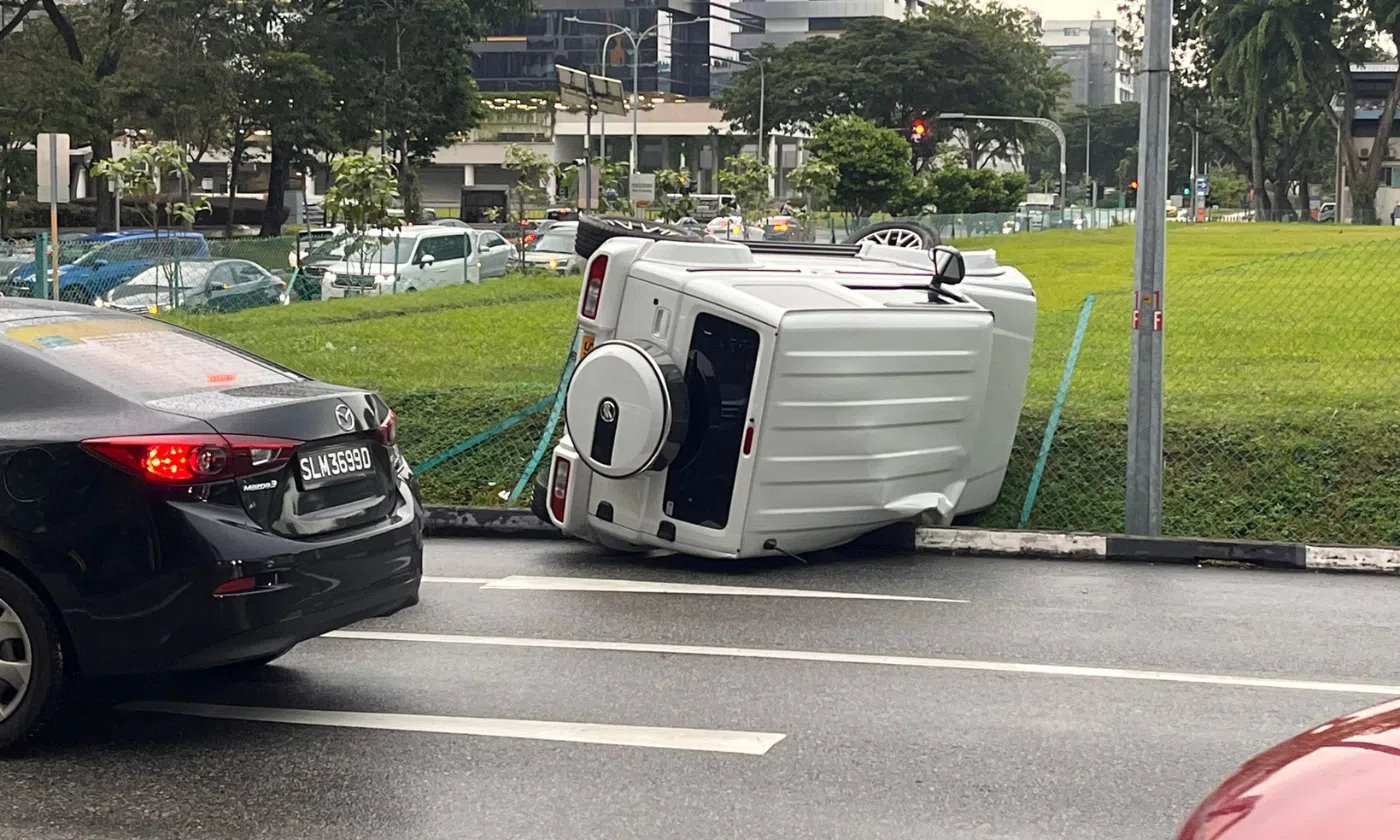 Motorists gawk at overturned vehicle resting on its side in Eunos | STOMP
