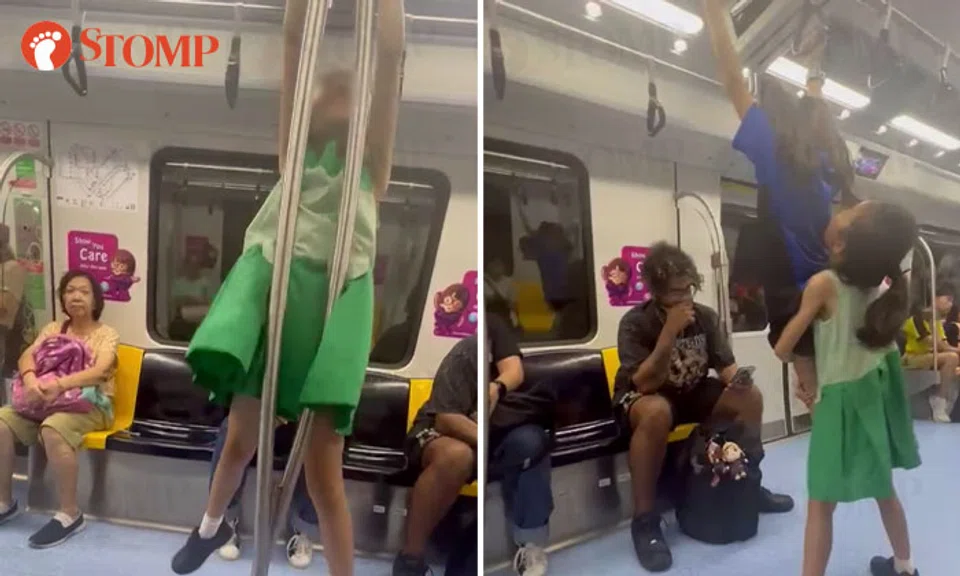 'Unruly' kids swing from handrails on MRT train despite commuter ...