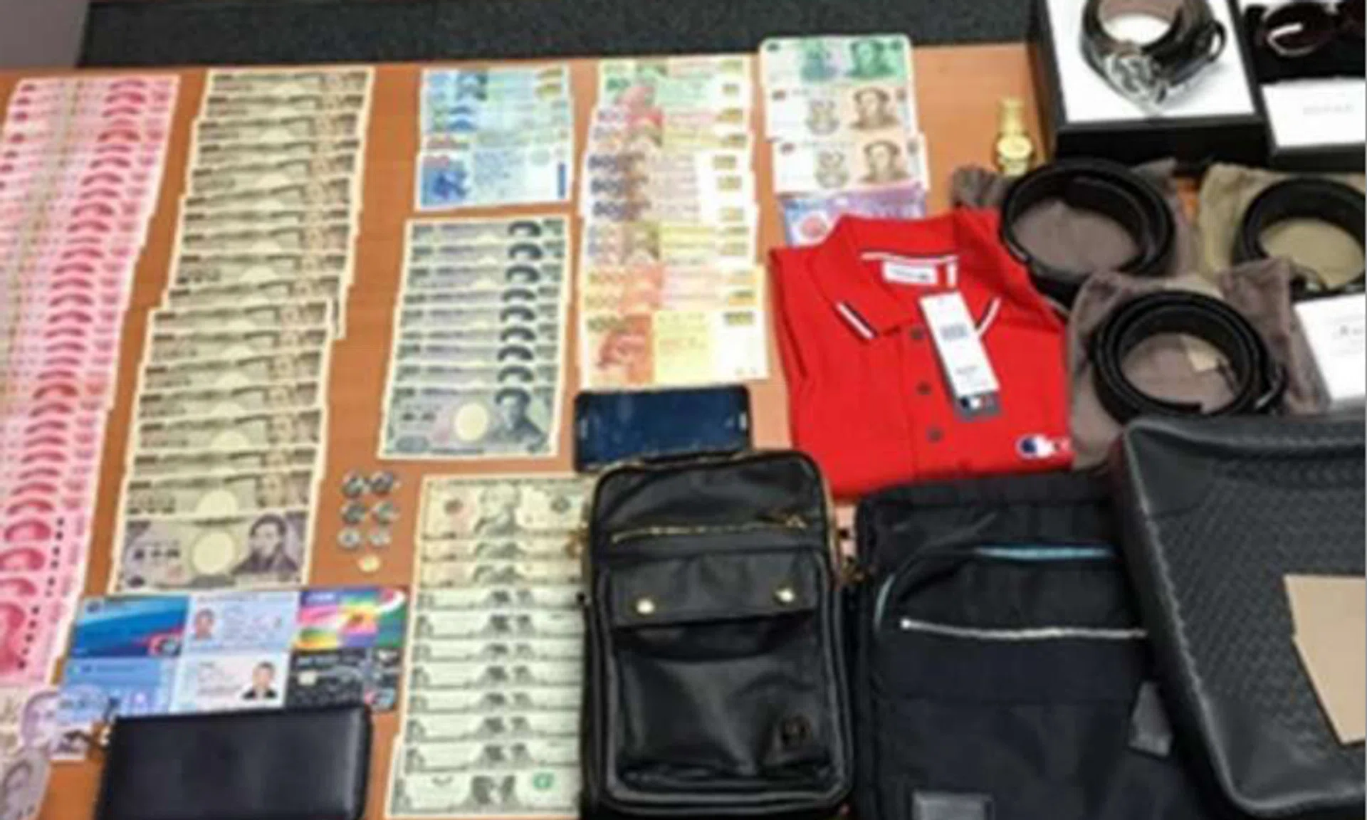 Cash and items worth $29,000 seized after police bust pickpocket ...