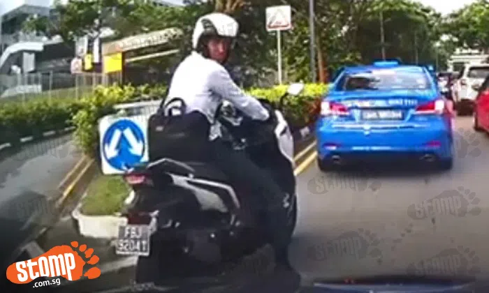 Biker abruptly cuts into Stomper's lane and glares at him when honked ...