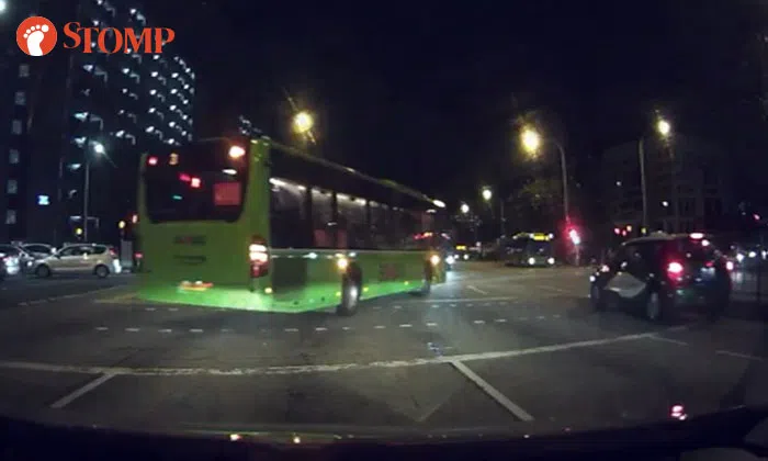 Bus cuts across multiple lanes to make right turn at Tampines junction ...