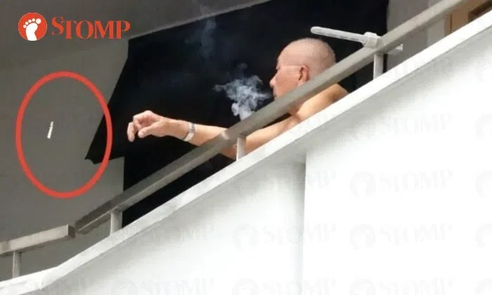 Shirtless man caught on video throwing cigarette from 13th storey of ...
