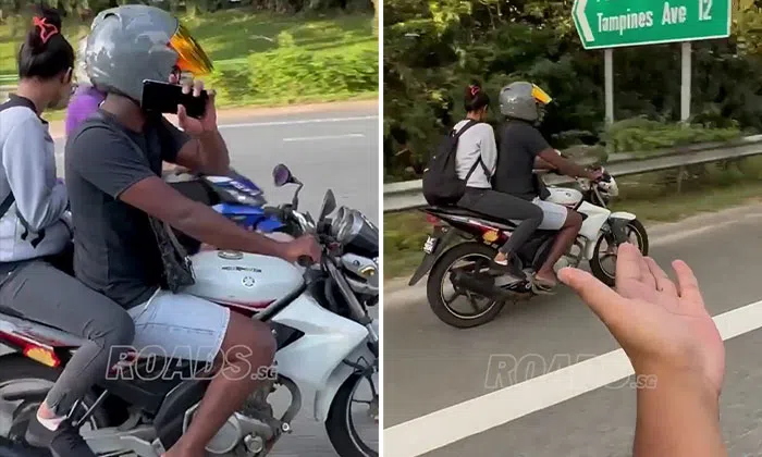 Motorcyclist uses phone while riding one-handed along TPE, pillion ...