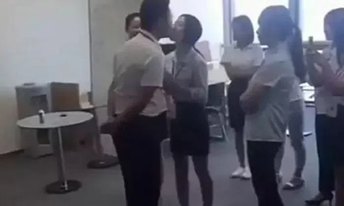 Beijing boss kisses all his female staff every morning to 'foster good ...