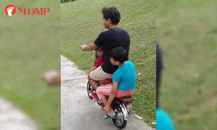 Man rides PMD with 2 kids on pavement in Woodlands: 'Nobody can stop me ...