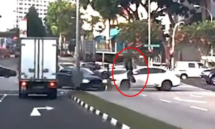 Biker flung off motorcycle after getting hit by car -- then bounces off ...