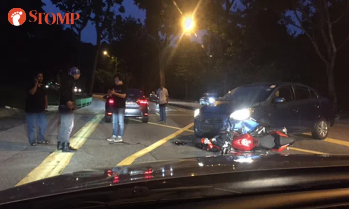 Biker flung off motorcycle, over car and lands on road after accident ...