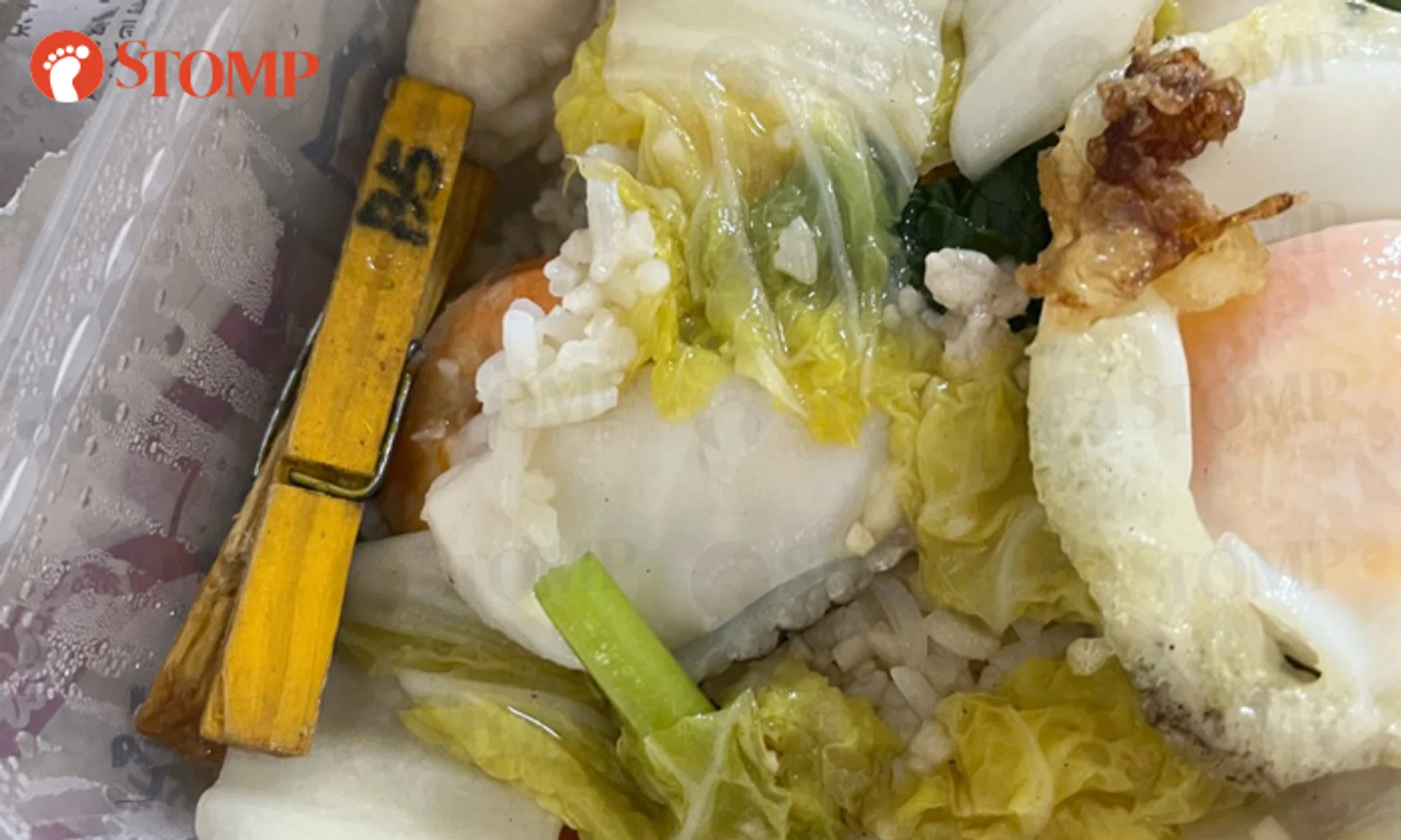 Woman finds wooden peg in rice from Kimly Seafood stall at Gangsa Road ...