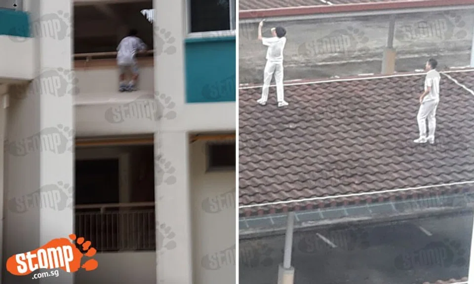 What are they thinking? One boy hangs on 2nd-story ledge, another 2 ...