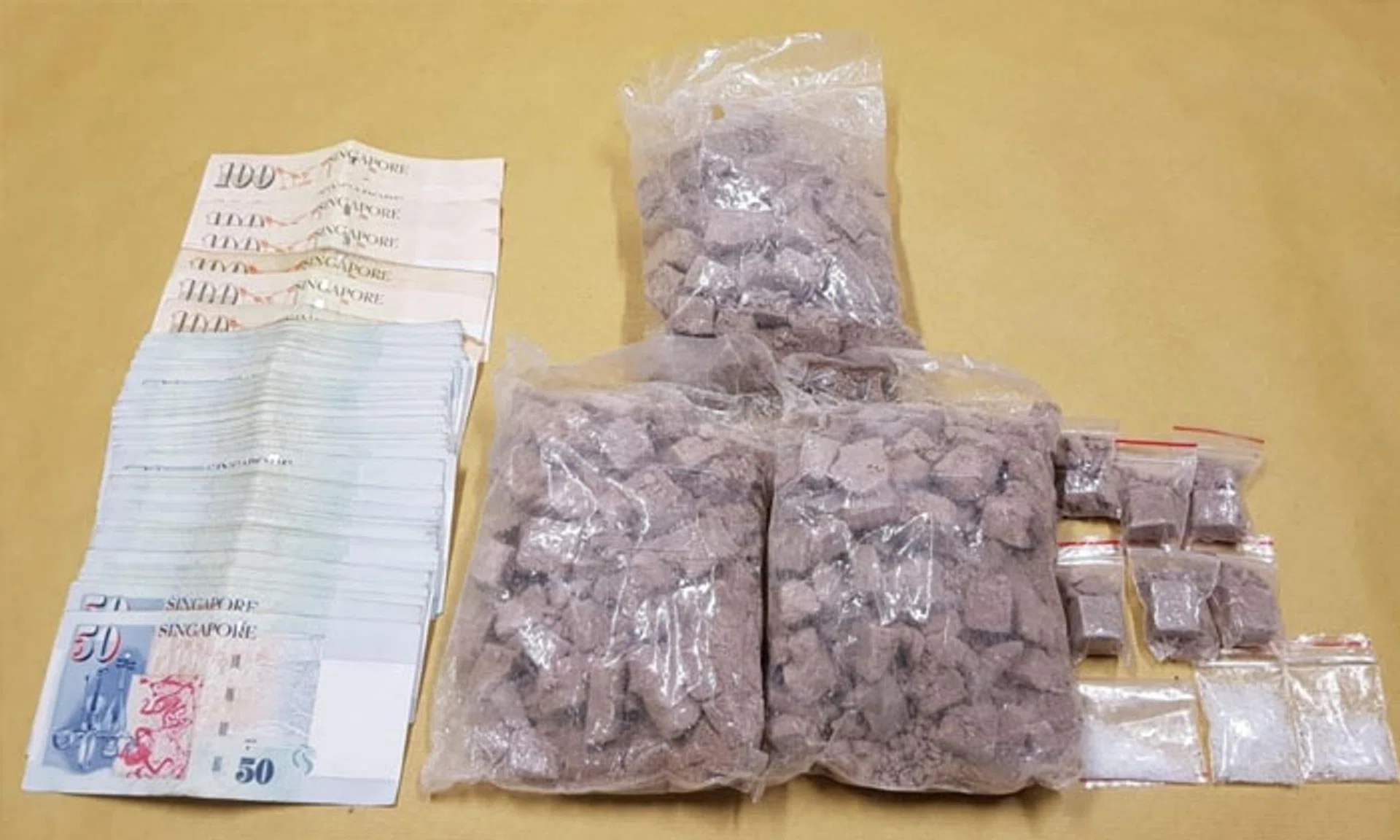 6 arrested and $102,000 worth of heroin seized in CNB raid | STOMP