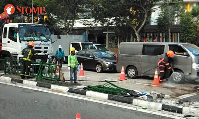 Man and woman taken to hospital after car accident at Sengkang junction ...