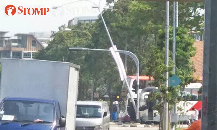 Bus hits and knocks over lamp post at Sims Ave | STOMP