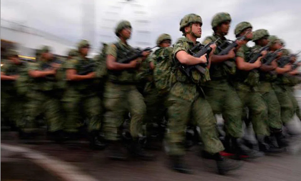 SAF regular serviceman dies after found unconscious at foot of building ...