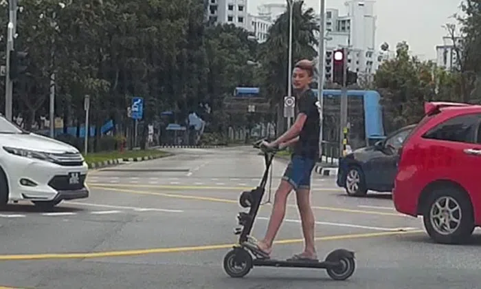 Check out this e-scooter rider's picture perfect pose while beating red ...