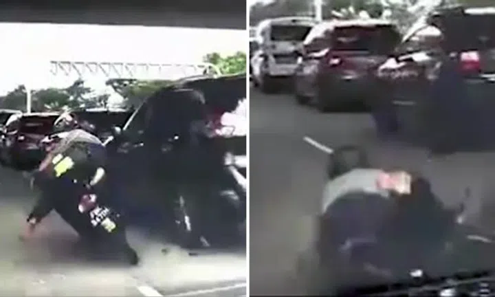 Driver swerves to avoid running over biker who crashed into car | STOMP