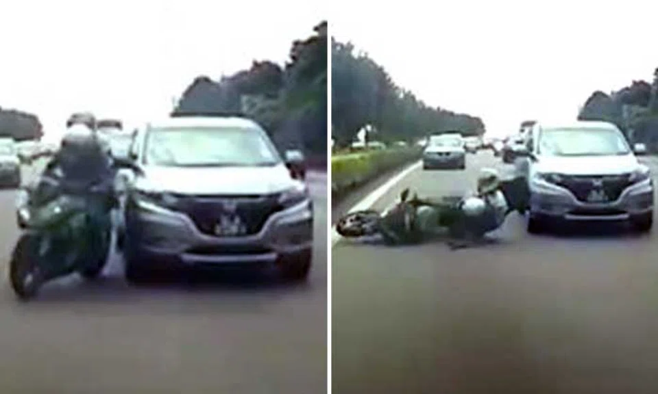 Driver makes lane change and knocks down biker speeding between lanes ...