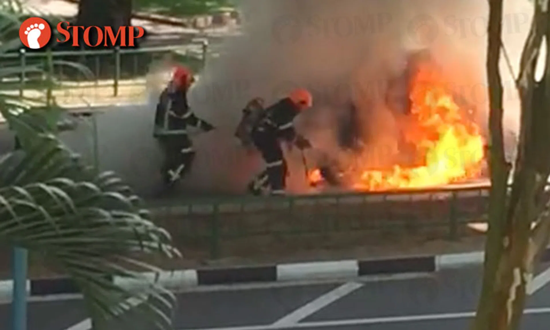 Roaring flames engulfing BMW at Rivervale Dr put out by brave SCDF ...