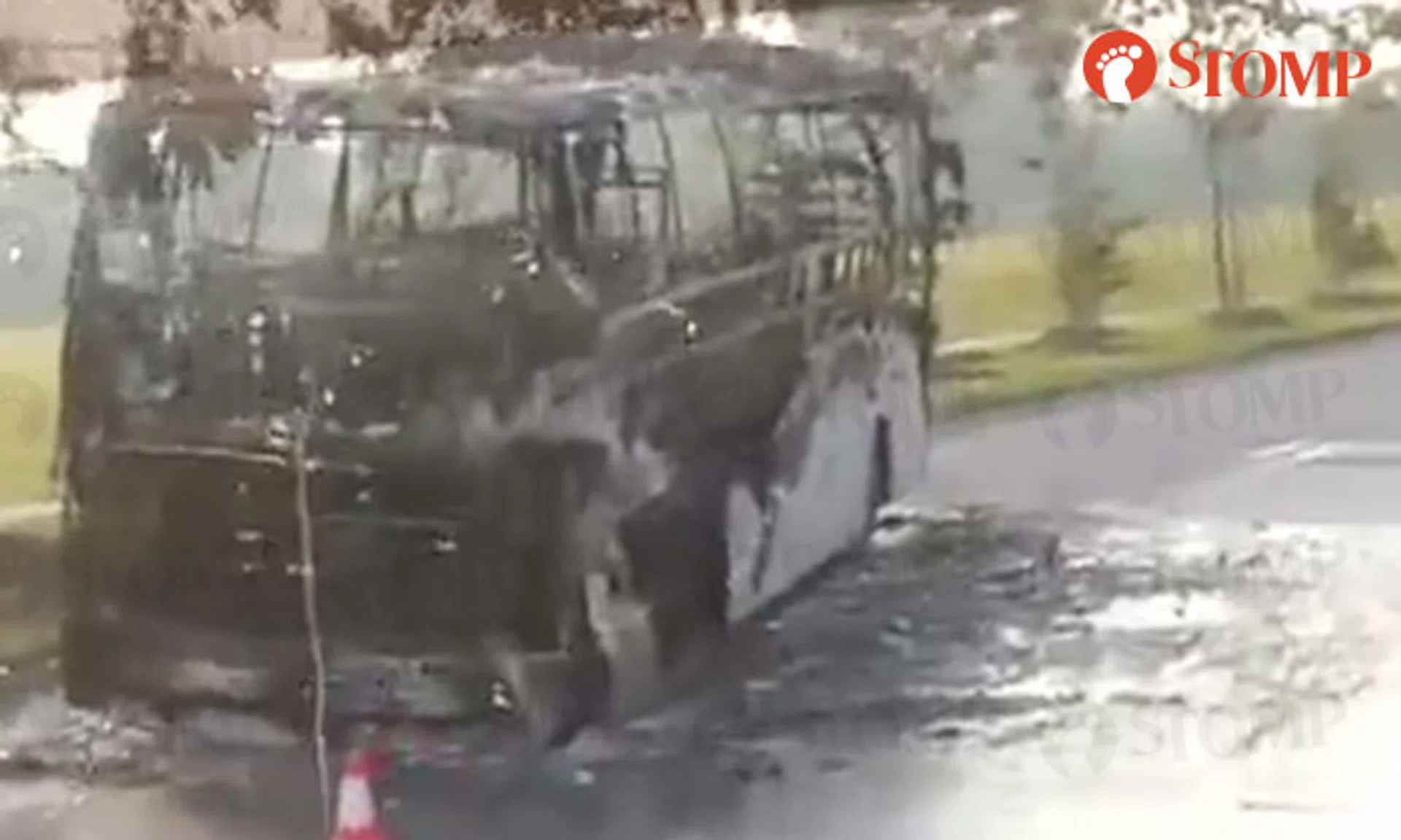 Bus burnt to crisp after vehicle fire along..., Latest News - STOMP