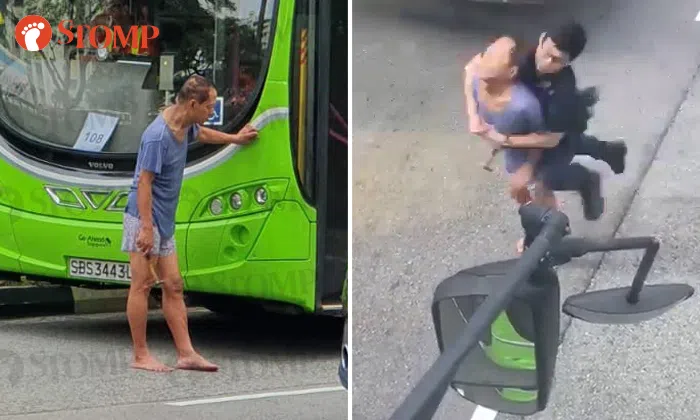 Man tackled to the ground by police after hitting vehicles with hammer ...