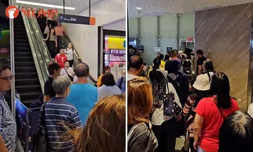 Tensions high as frustrated crowd forced to use lifts during escalator ...