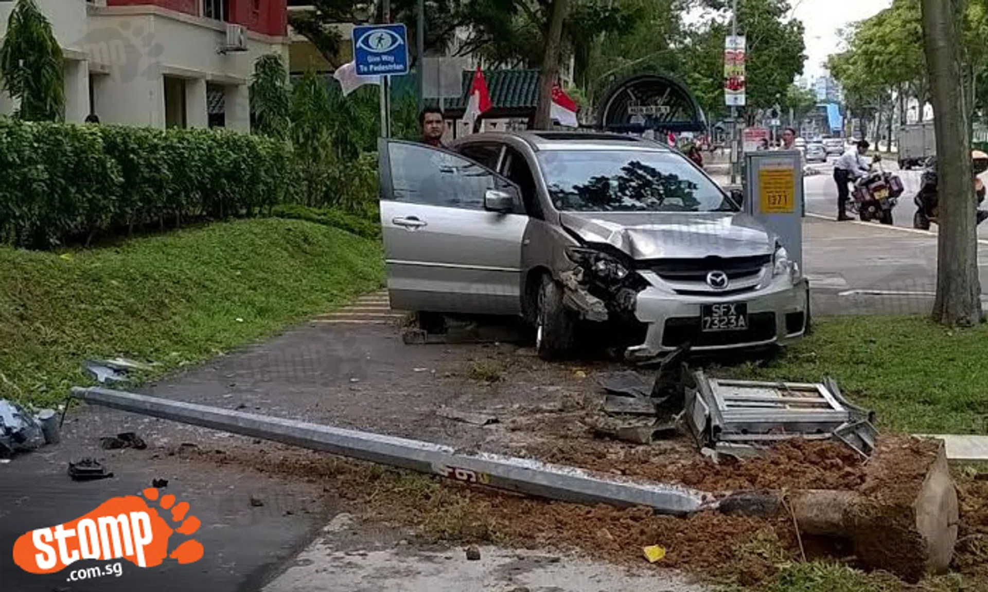 Lamp post uprooted after car crashes into it along Pasir Ris St 52 | STOMP