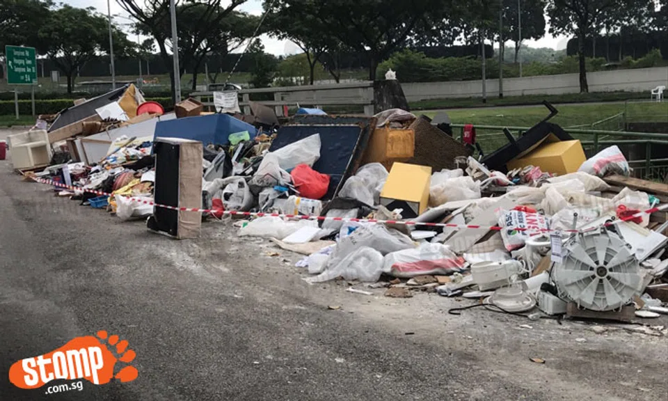 What an eyesore! Huge pile of rubbish left by side of road at Defu ...