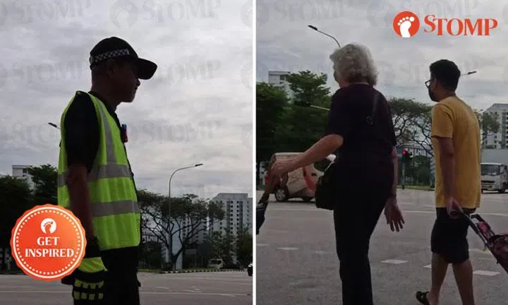 Traffic controller praised for helping elderly woman cross busy ...