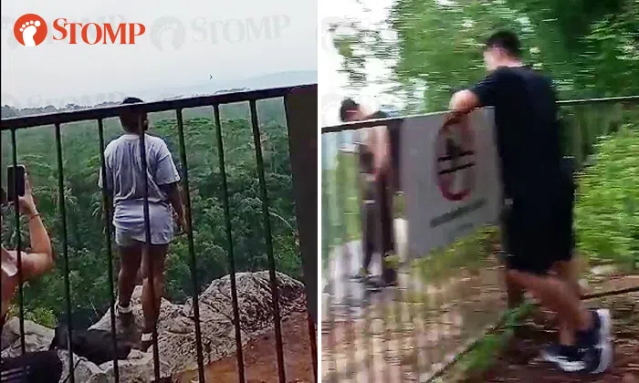 Hikers climb over barricade to take photos on Pulau Ubin cliff despite warning sign | STOMP