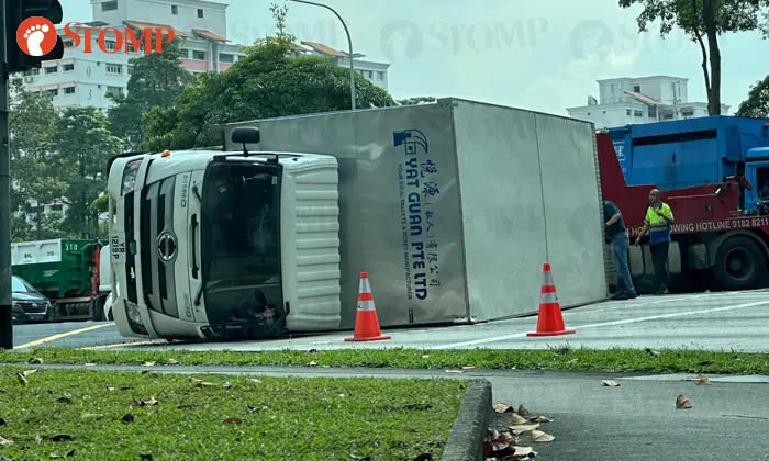 Burst tyre causes truck to topple on its side in Choa Chu Kang | STOMP