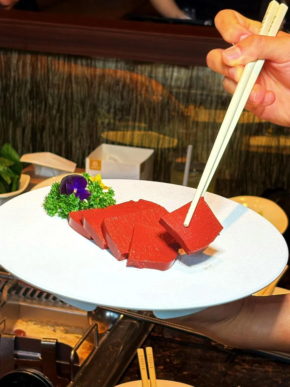 Baying for blood: Pig blood curd back on menus, sold out in ...