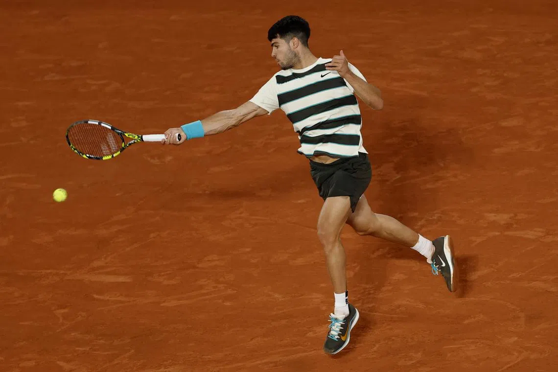 Alcaraz returns to French Open final after ailing Musetti retires | The Straits Times