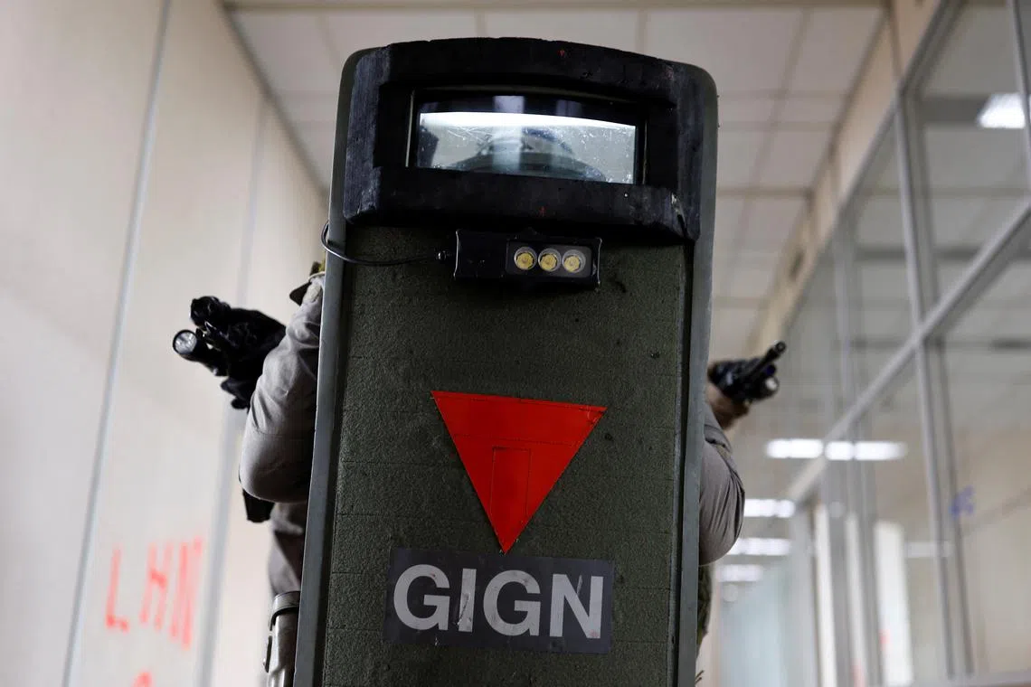 Elite French tactical unit hopes for peaceful Paris Games | The Straits ...