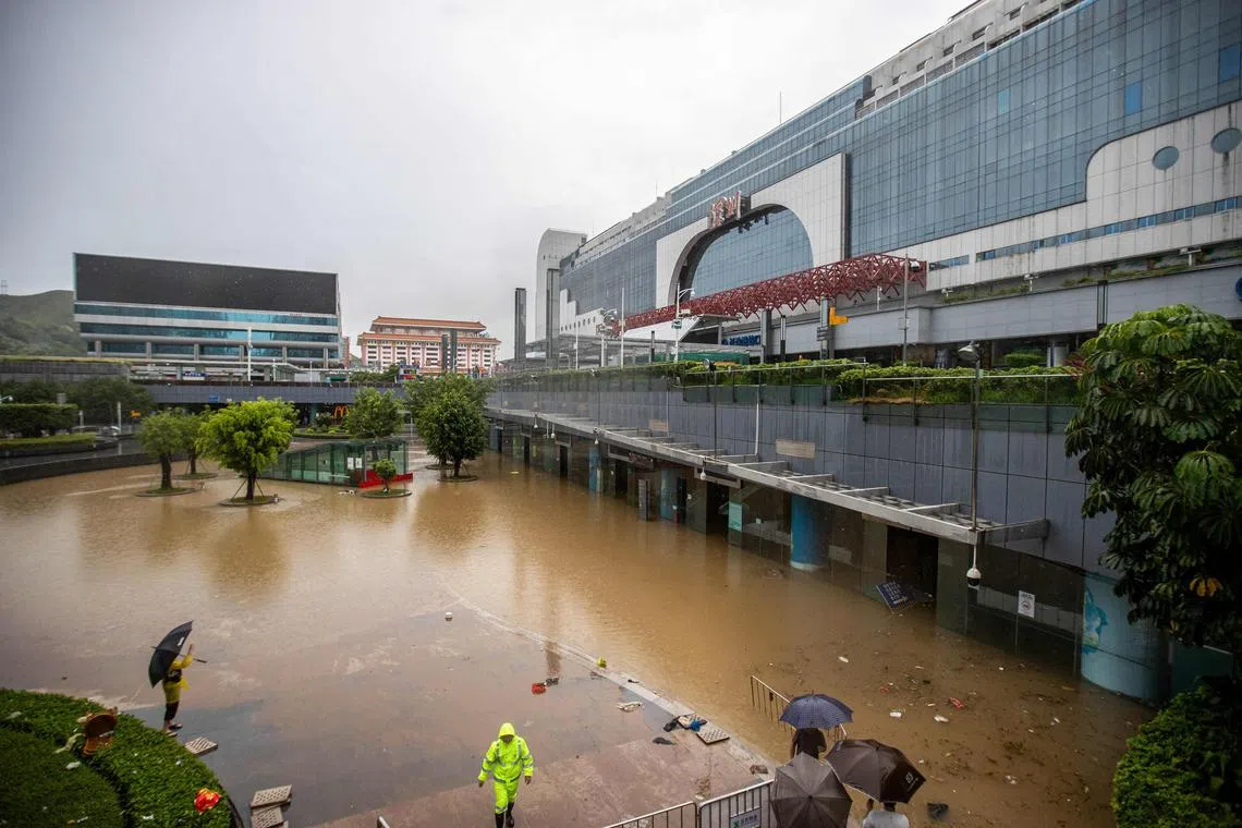 The flooded Shenzhen Bus Station is seen after the city was hit by ...