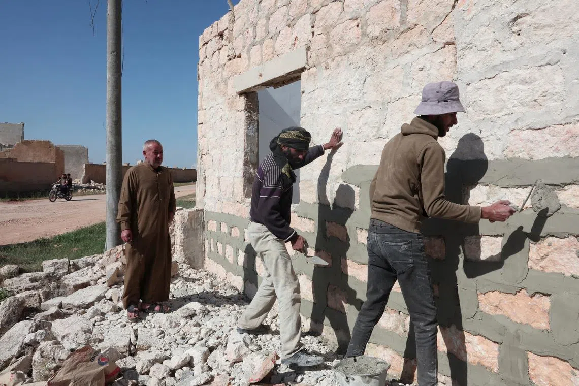 Lacking aid, Syrians do what they can to rebuild devastated Aleppo ...