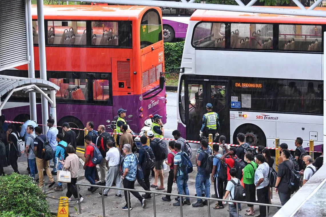 Longer travel time, snaking bus queues: EWL passengers cope with 2nd day of train disruption ...