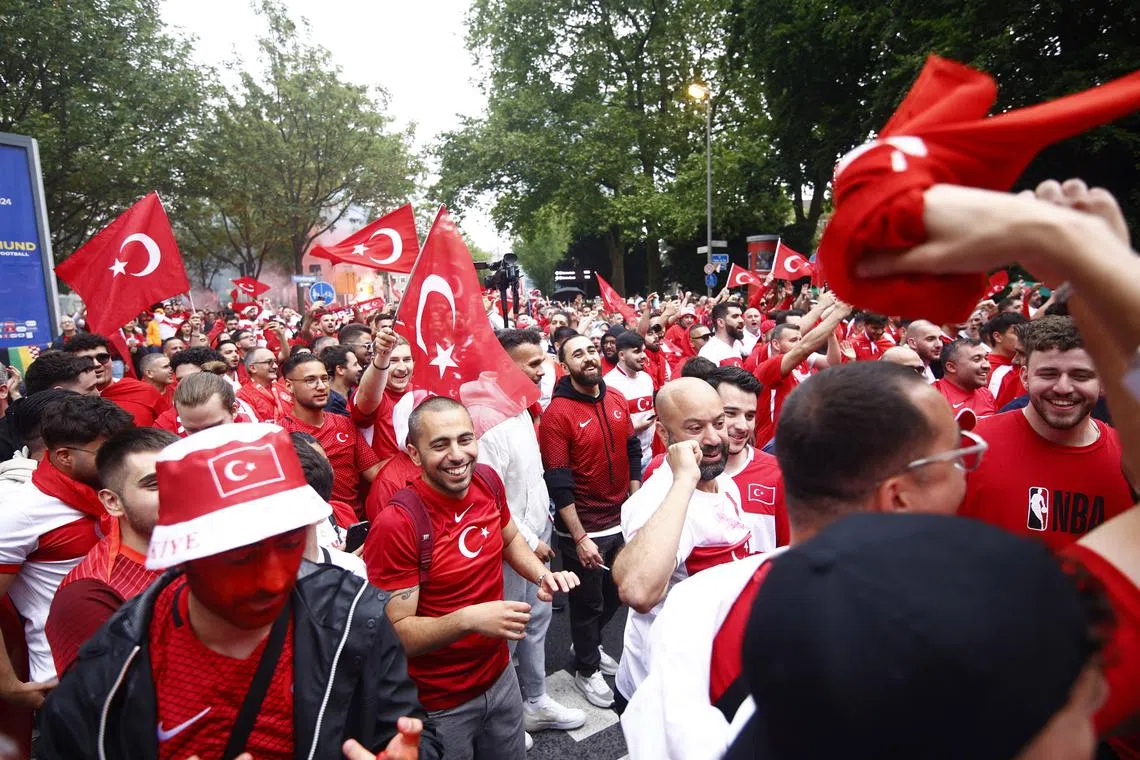 Germany's Turks give 'host nation' welcome to Turkey | The Straits Times