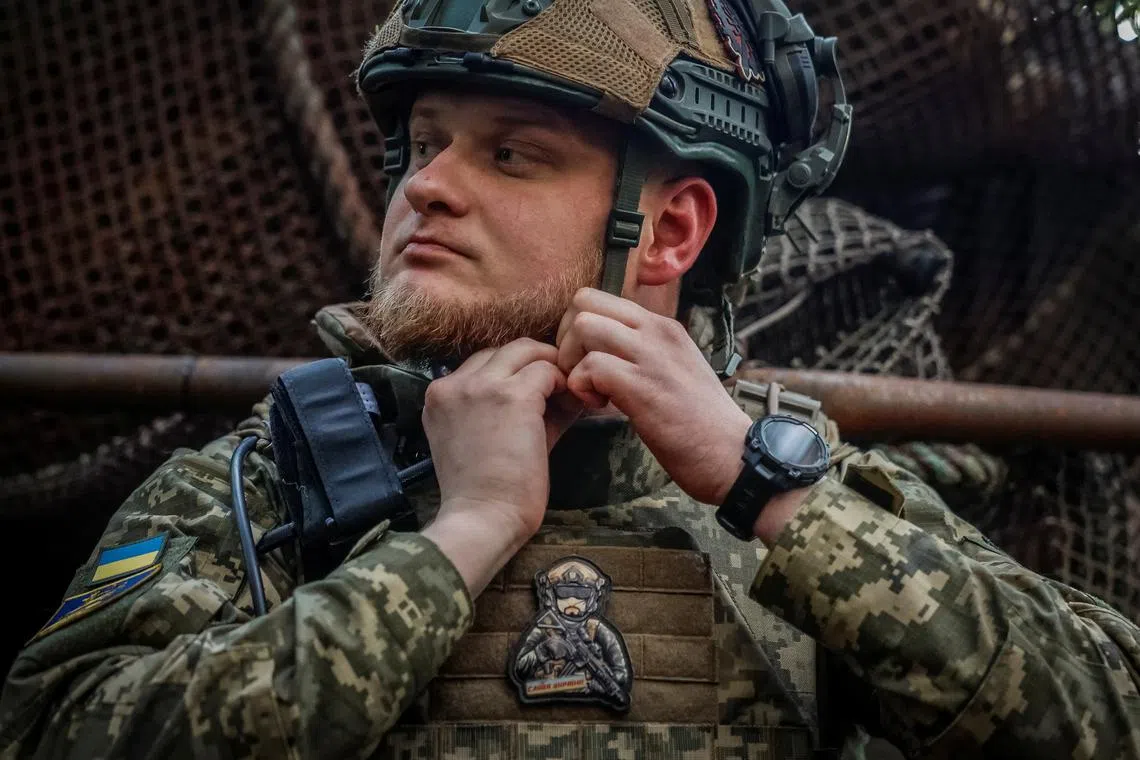 Under fire on front line, Ukrainian soldiers doubt talks will bring ...