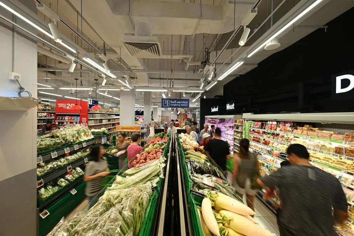 Supermarket chains roll out CDC voucher promotions to help S’pore ...